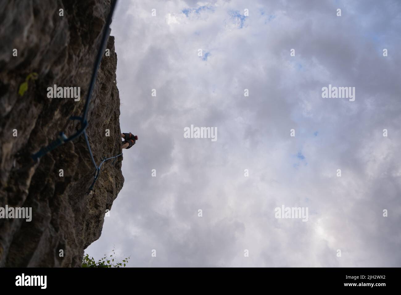 Handsome and fit senior guy got to the highest point on the rock Stock ...