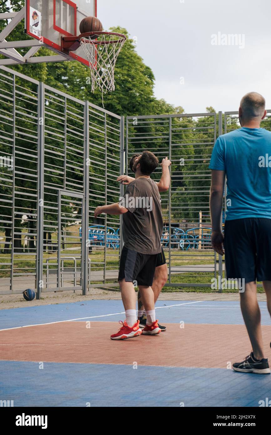big strong basketball player outdoors court Stock Photo - Alamy