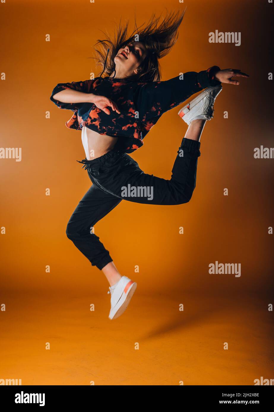 Female dance dancer exercising poses during a dance practice Stock ...