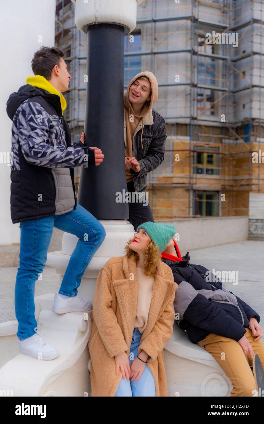 Group of amazing and beautiful youg friends are hanging out together ...