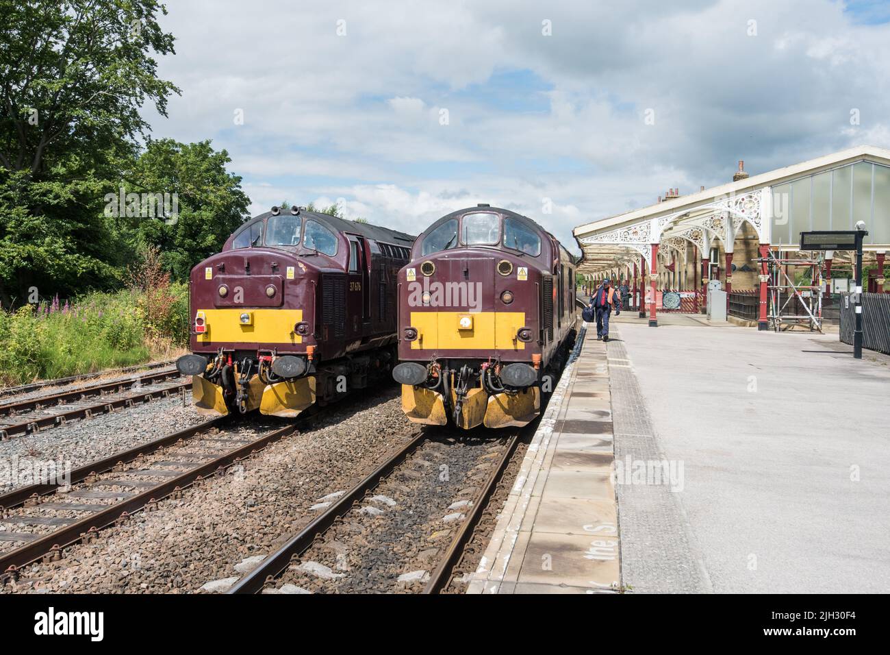 Class 37 diesel electric 37706 and 37676 on adjacent lines at ...