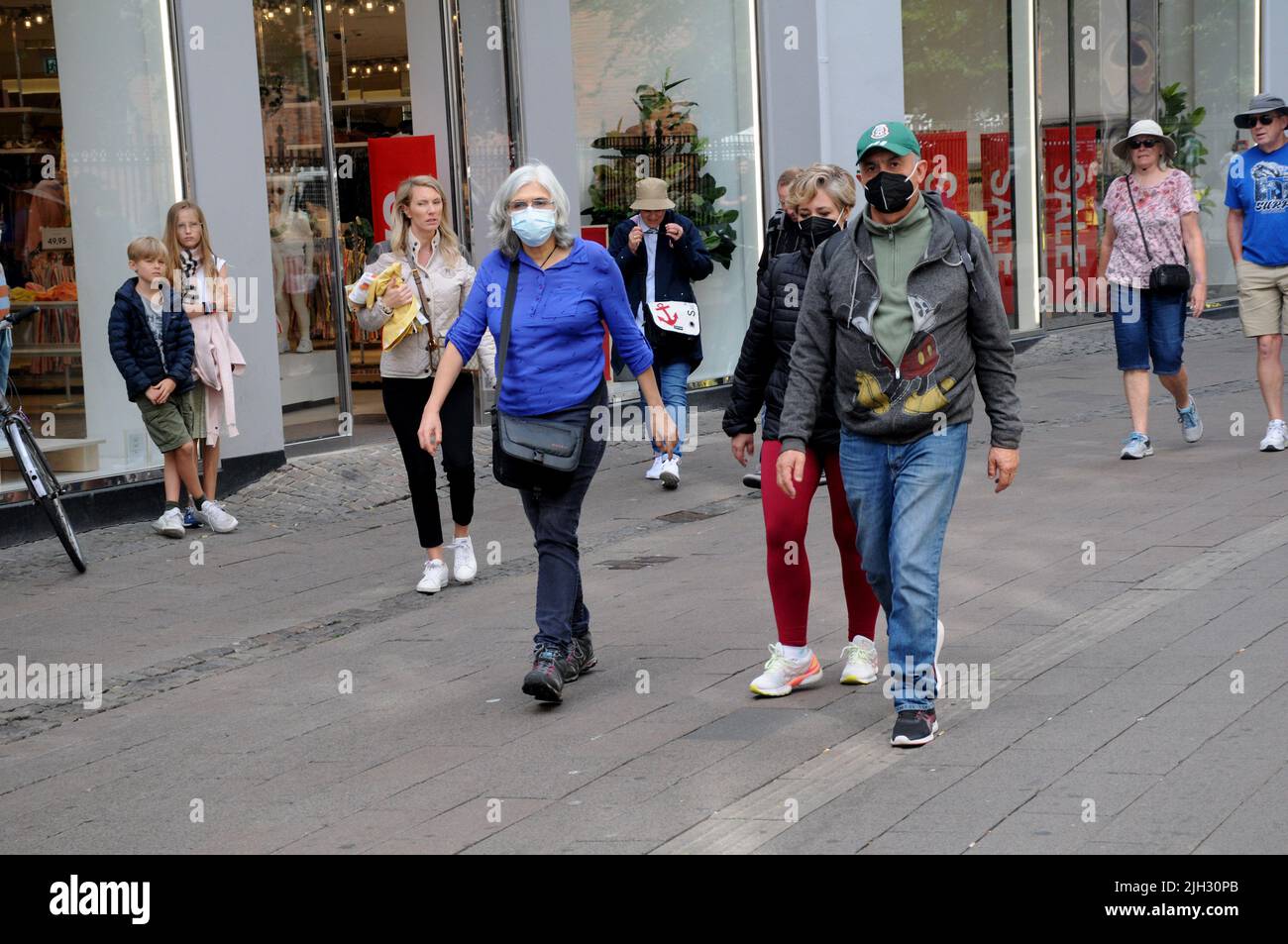 Copenhagen /Denmark/14 July 2022/Tourists wear face mask during visiing ...
