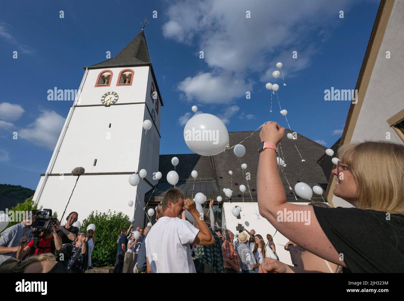 Schuld, Germany. 14th July, 2022. Residents of Schuld release white ...