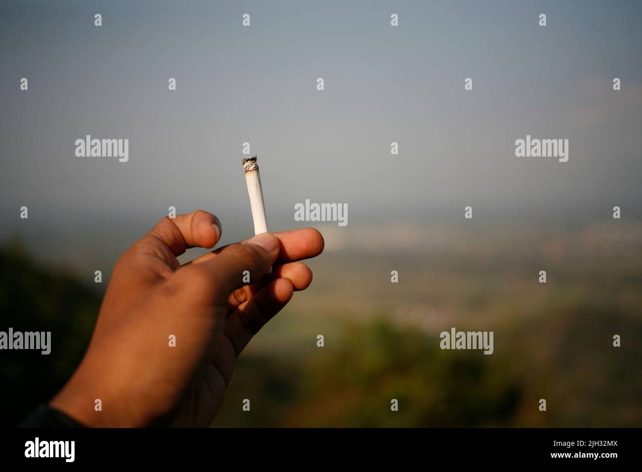 Roll up cigarette hi-res stock photography and images - Alamy