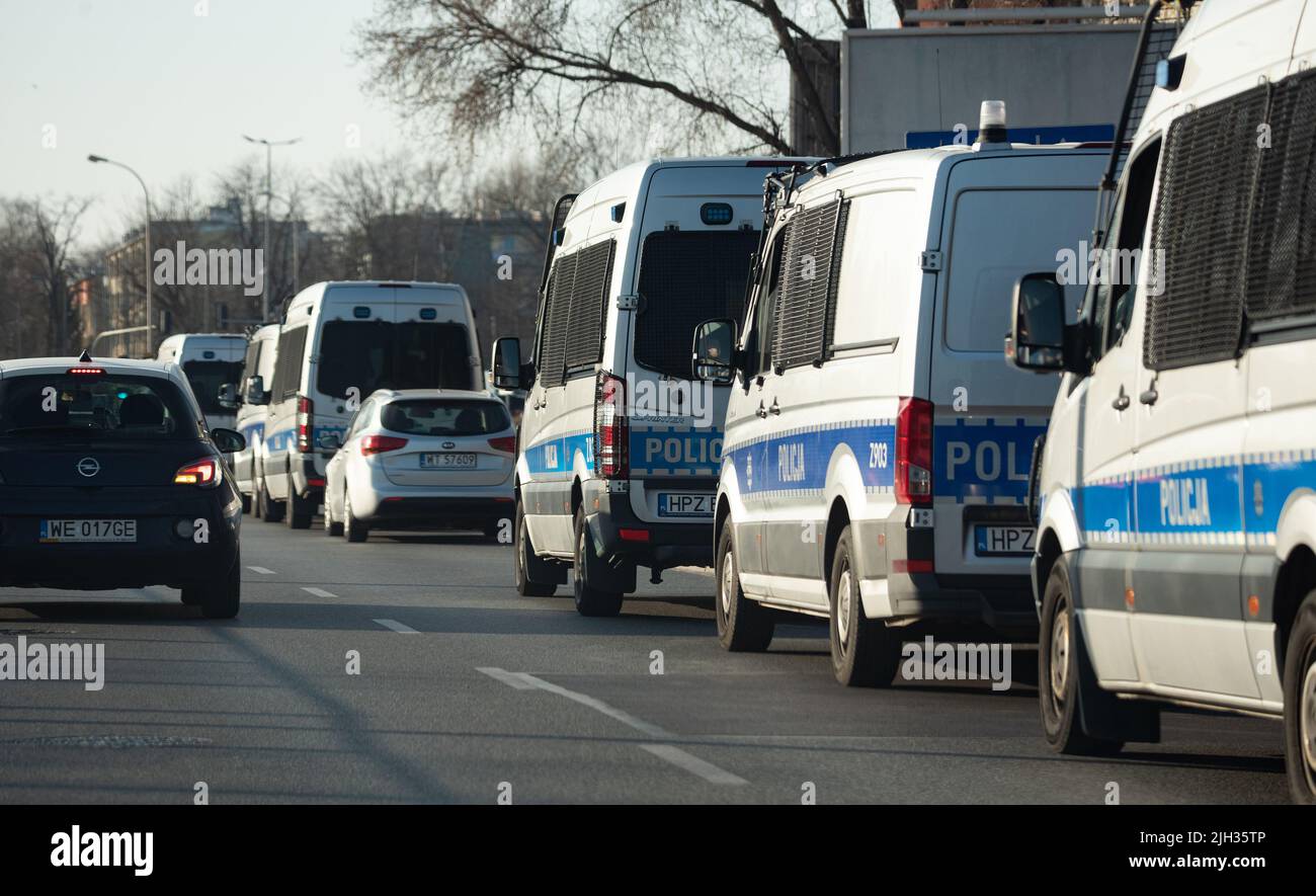 Warsaw, Poland - March 24, 2022: Several police cars on the street in ...
