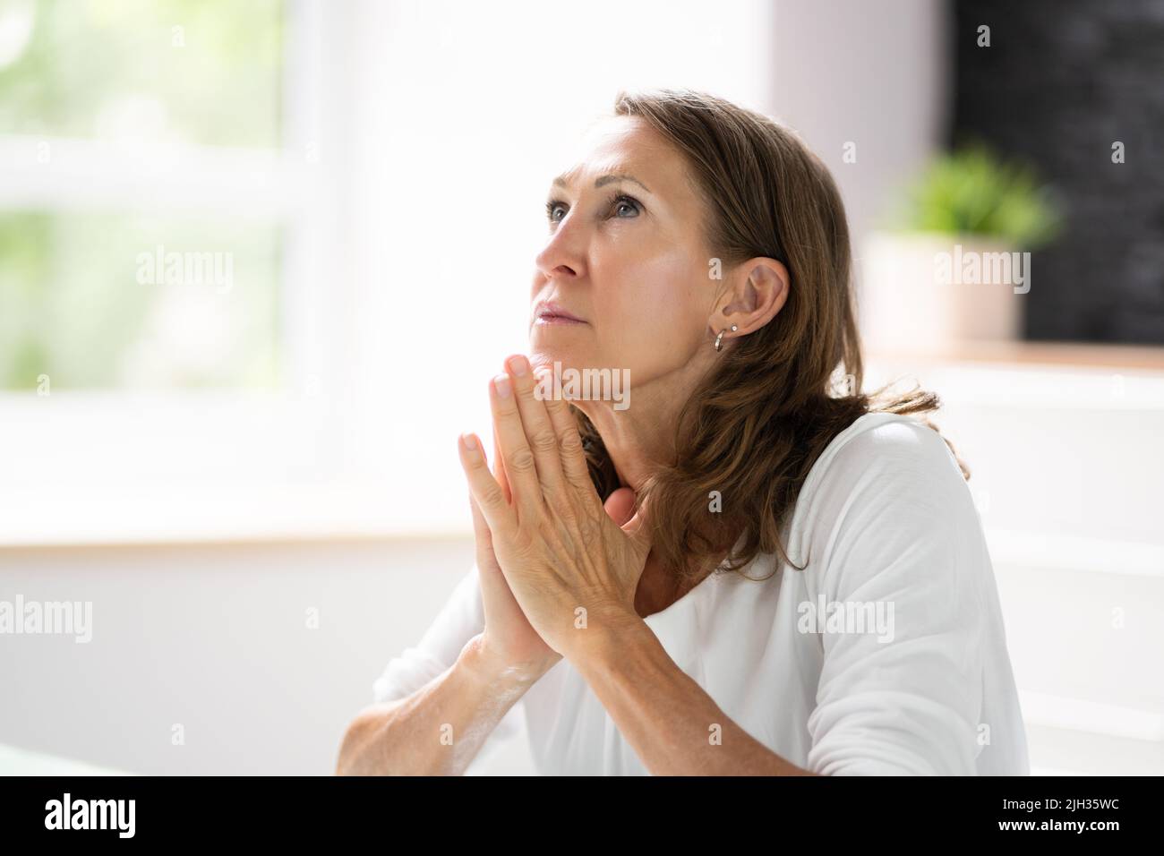 Praying Religious Woman. Christian Prayer Seeking God Stock Photo - Alamy