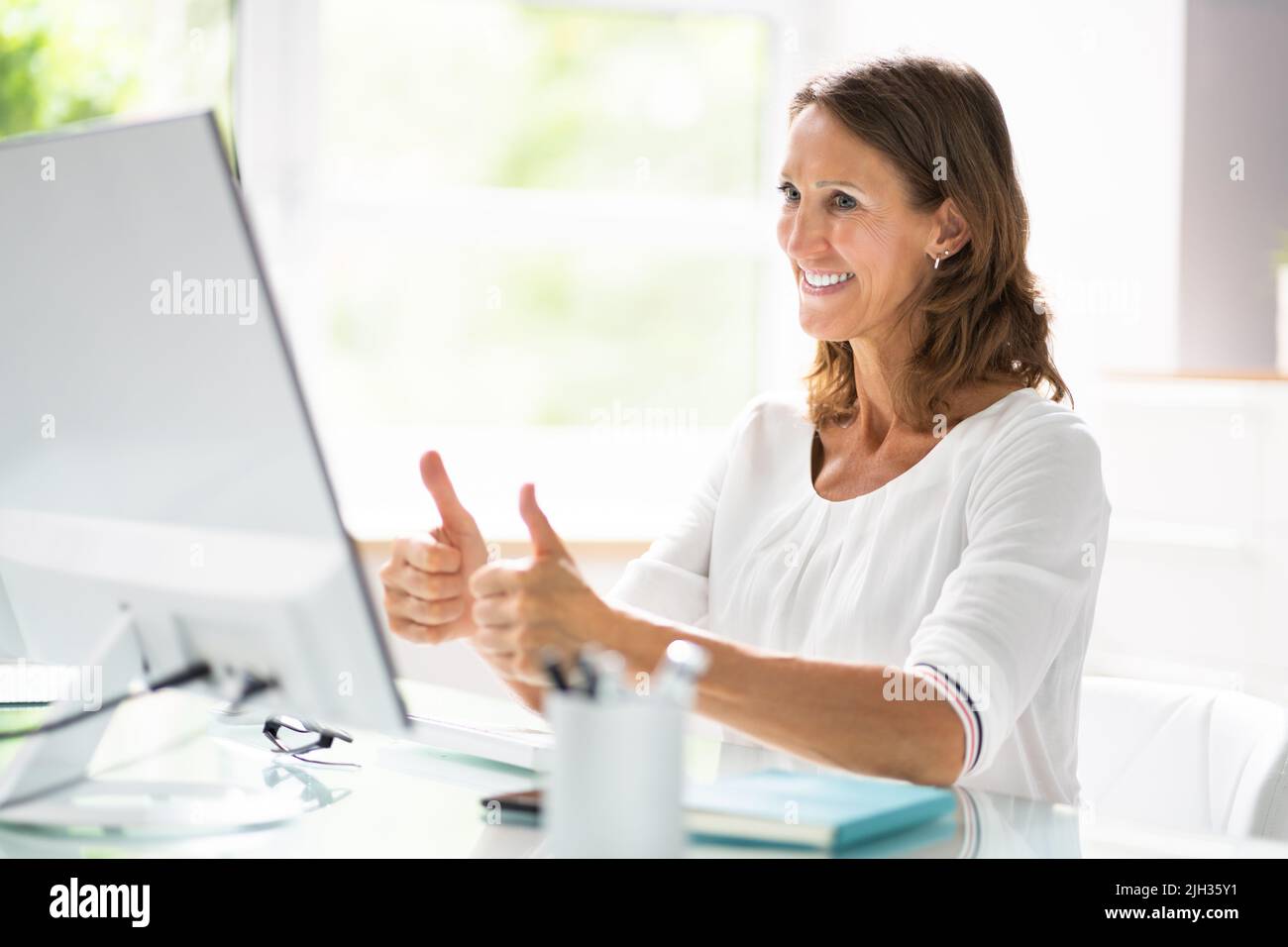 Young Happy Business Woman In Video Conferencing Call Stock Photo - Alamy