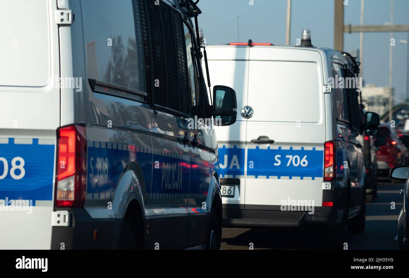 Warsaw, Poland - March 24, 2022: Several police cars on the street in ...
