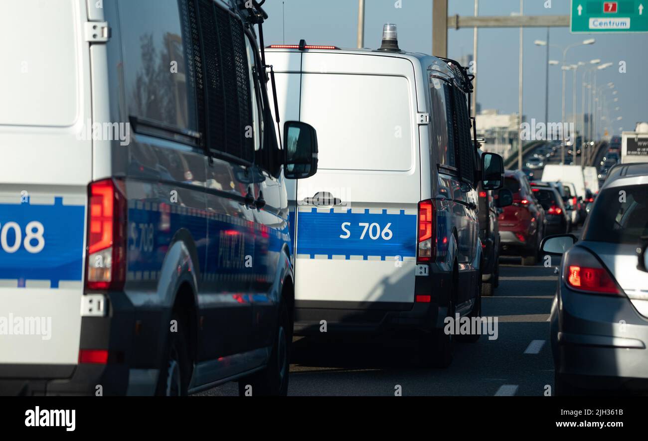 Warsaw, Poland - March 24, 2022: Several police cars on the street in ...