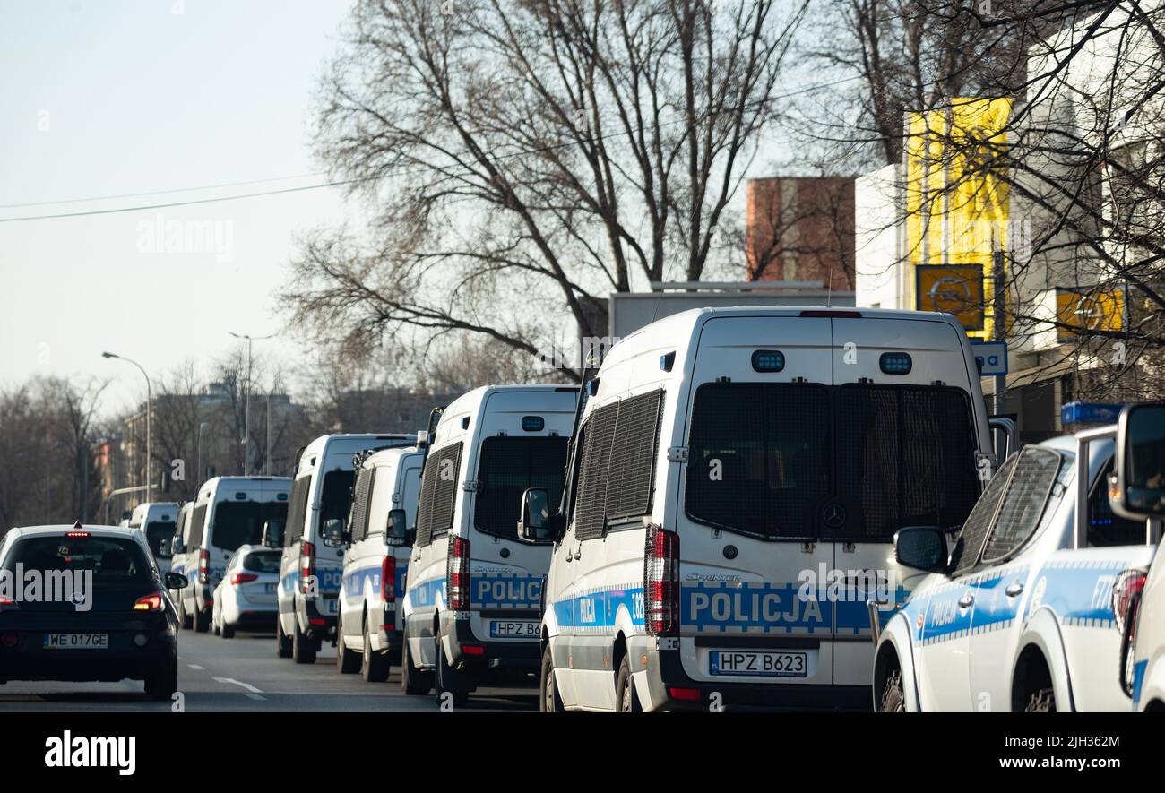 Warsaw, Poland - March 24, 2022: Several police cars on the street in ...