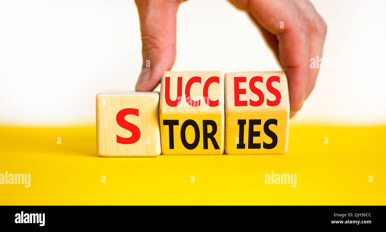 Success stories symbol. Concept words Success stories on wooden cubes ...