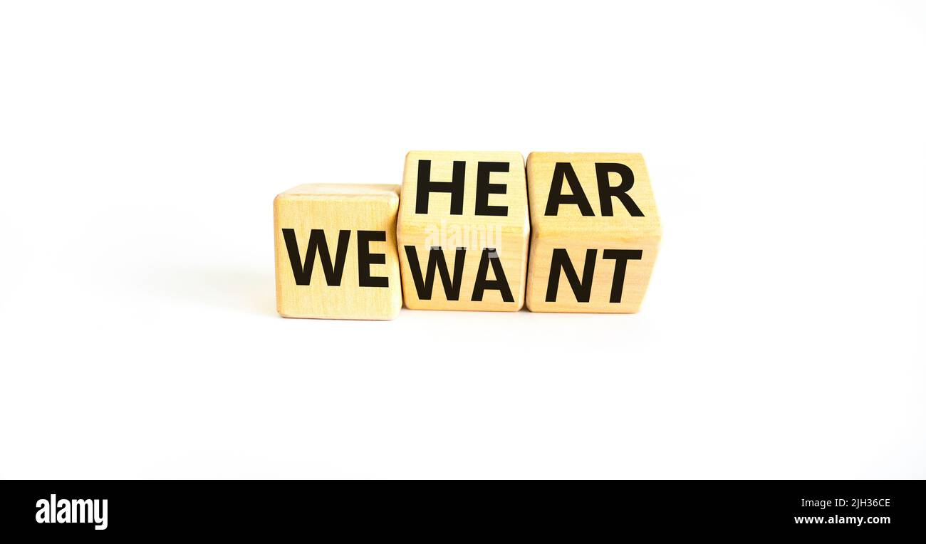 We hear and want symbol. Concept words We hear we want on wooden cubes ...
