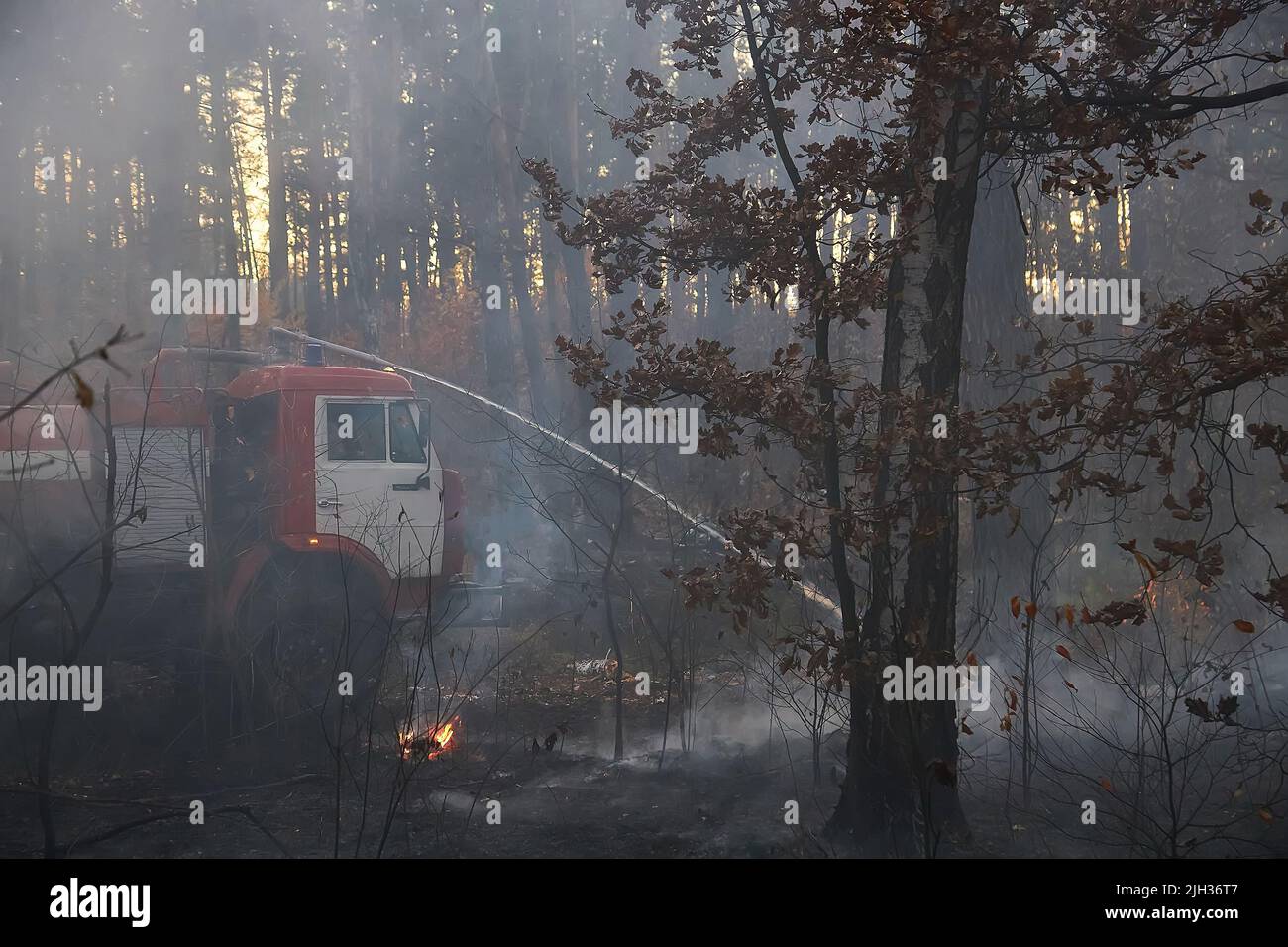 Water cannon of a fire engine shooting a high-velocity stream of water ...