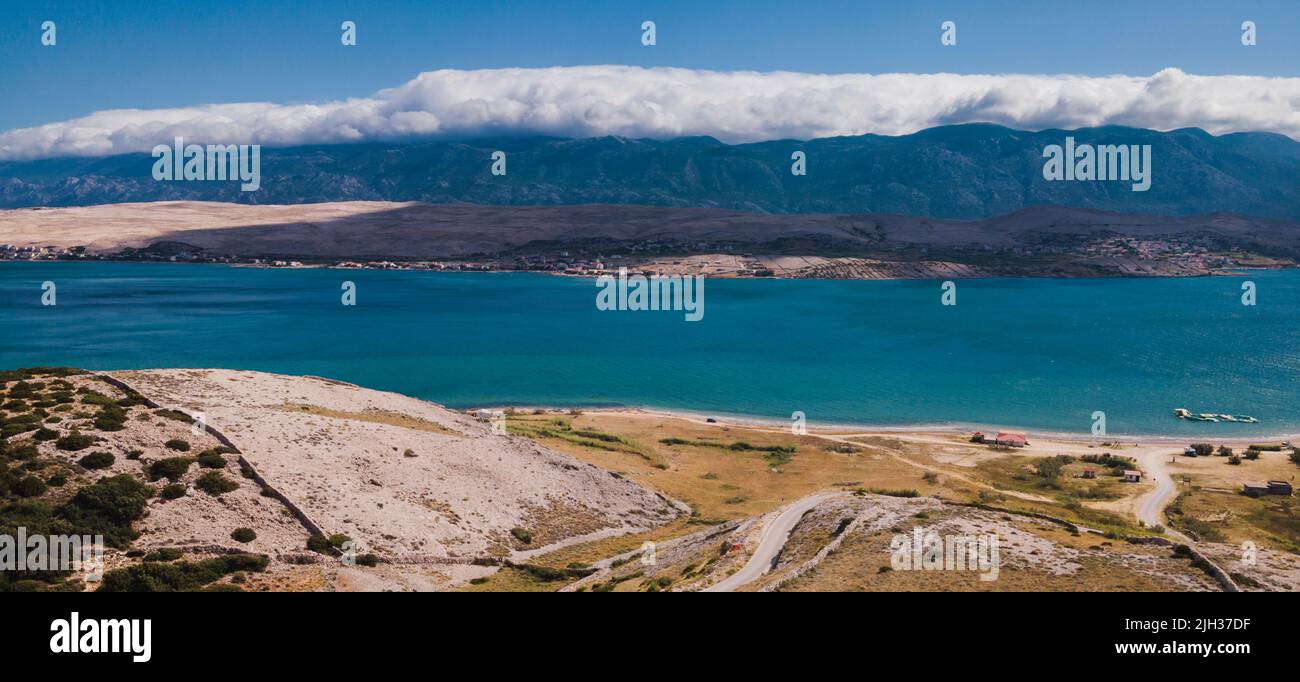 Drone flight over the beautiful island of Pag in Croatia, simuni ...