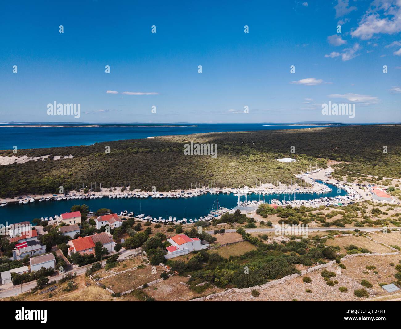 Drone flight over the beautiful island of Pag in Croatia, simuni ...