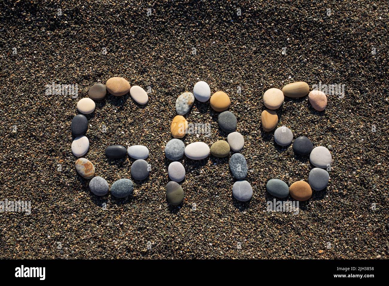 word gas on sandy beach. Energy and fuel concept Stock Photo - Alamy