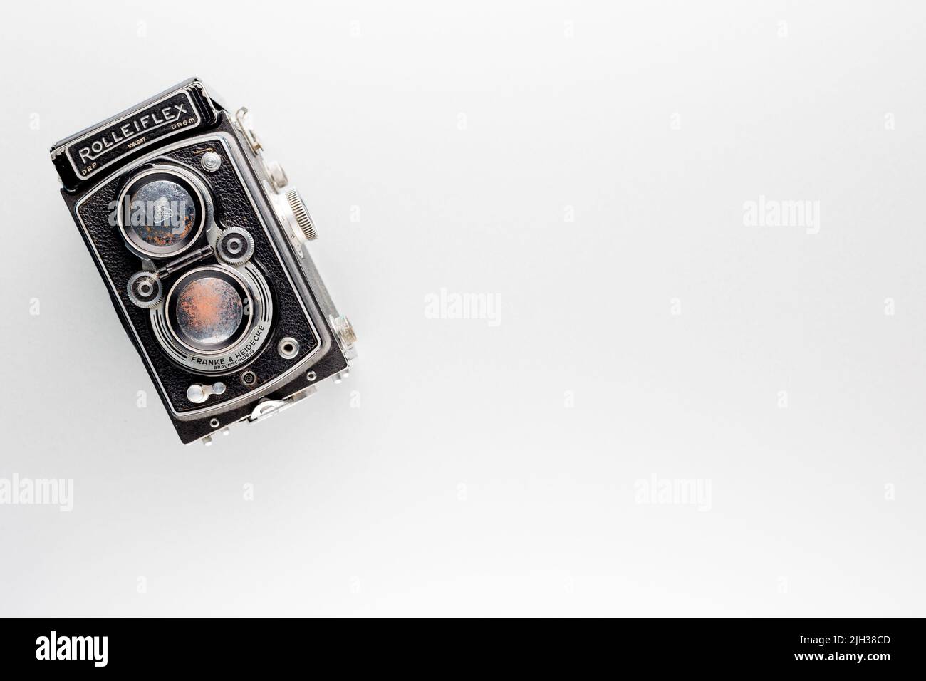 Vintage Rolleiflex Camera on a grey background Stock Photo - Alamy