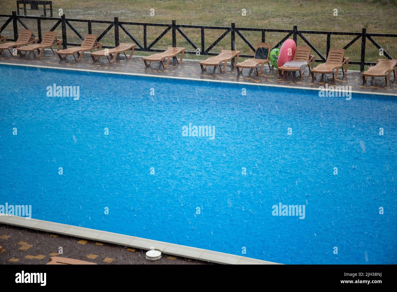 Rain and wind spoil the summer weather at the vacation center Stock ...