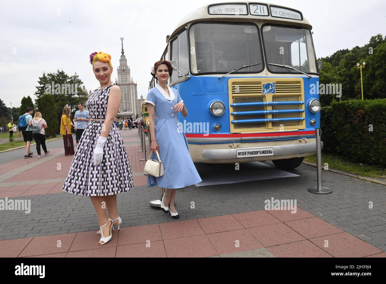 Moscow. Girls at 'ZIS 155' retrobus on Sparrow Hills during the ...