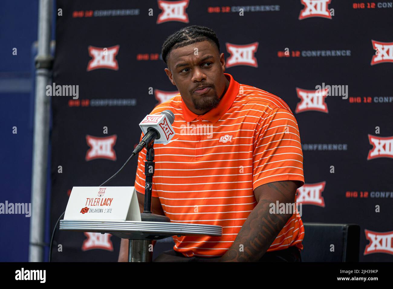 Oklahoma State Cowboys defensive lineman Tyler Lacy speaks during Big ...