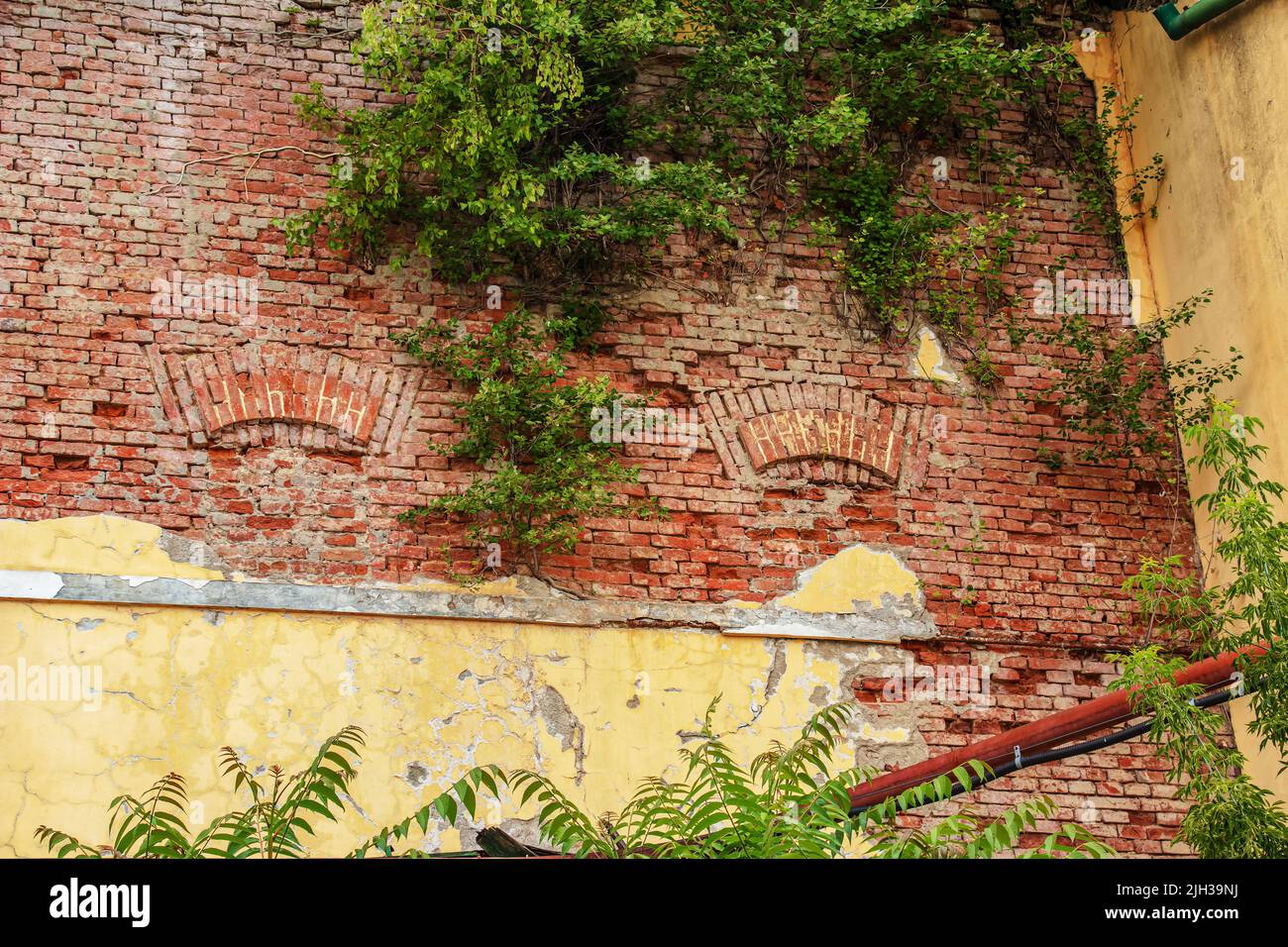 Red brick walls of an old brewery building. The old building of the ...