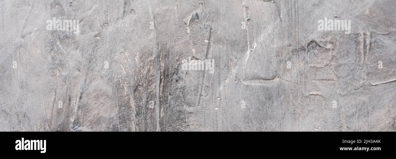 gray textured background created from putty. Web banner Stock Photo - Alamy