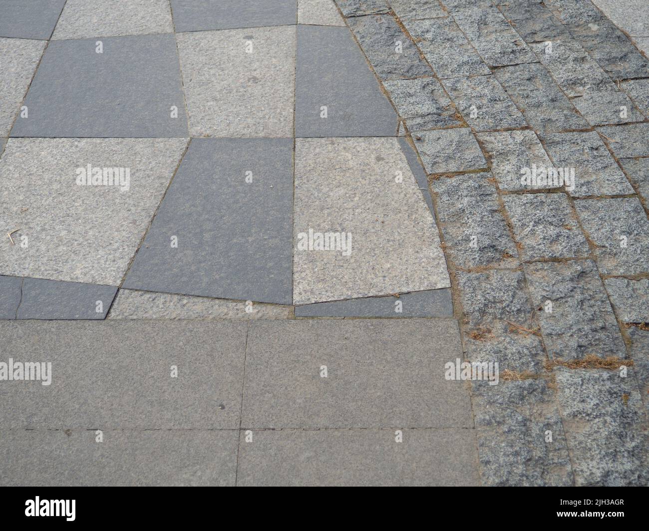 Drawing tiles on the pavement. Stone street surface. Masonry. Tile ...