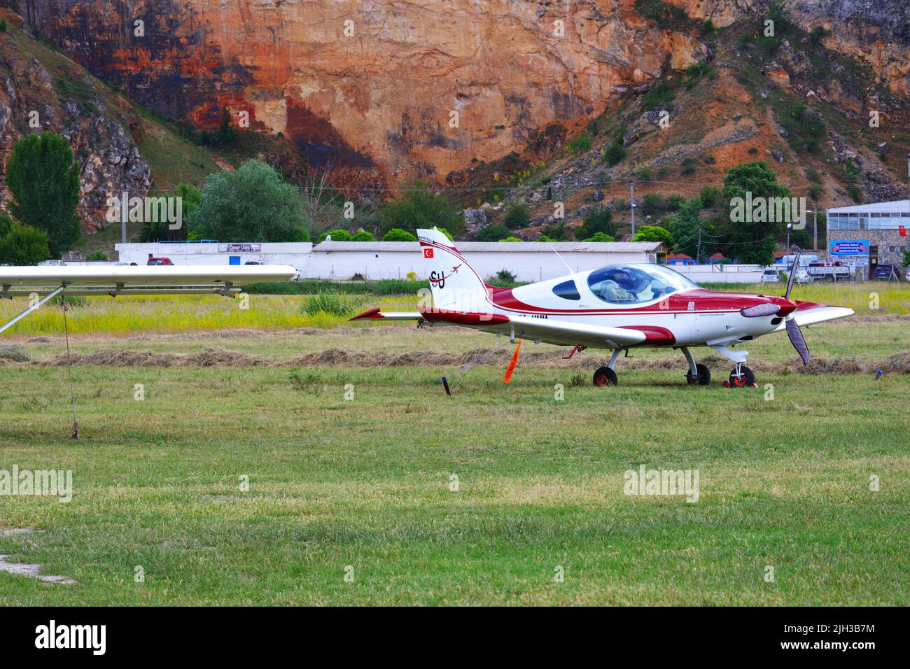 Red and white small airplane outdoor Stock Photo - Alamy