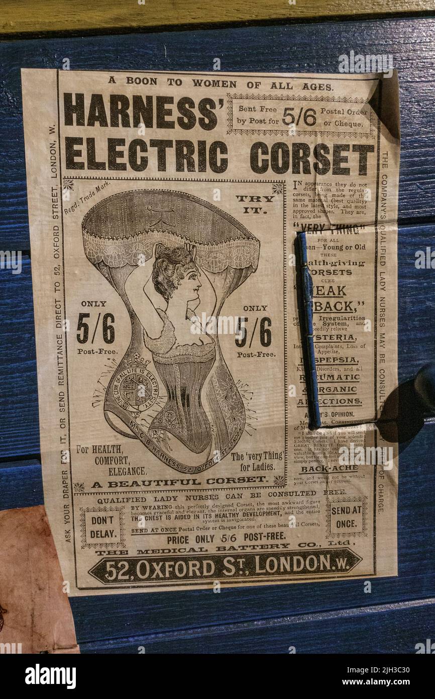 Advertising poster for "Harness' Electric Corset" (1890s) on display in ...