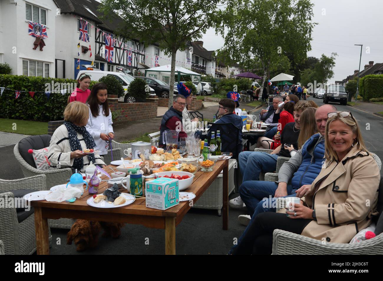 People Eating and Drinking at Street Party Celebrating Queen Elizabeth ...