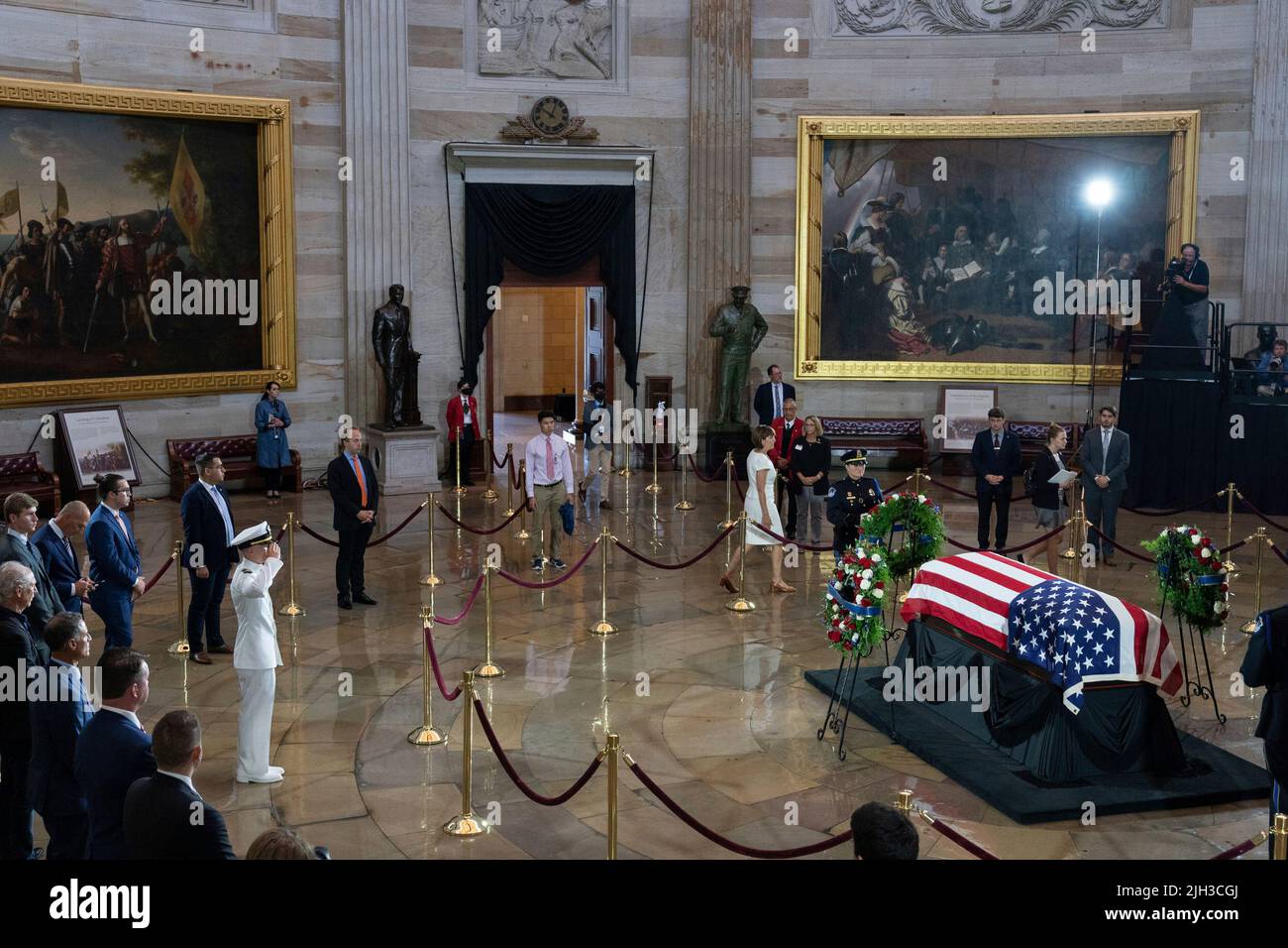 Washington DC, USA. 14th July, 2022. A midshipman salutes the casket of ...