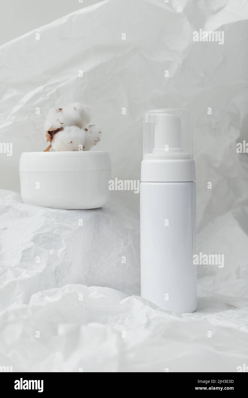Empty white cosmetic bottle with dispenser, sample. Soft Cosmetic ...