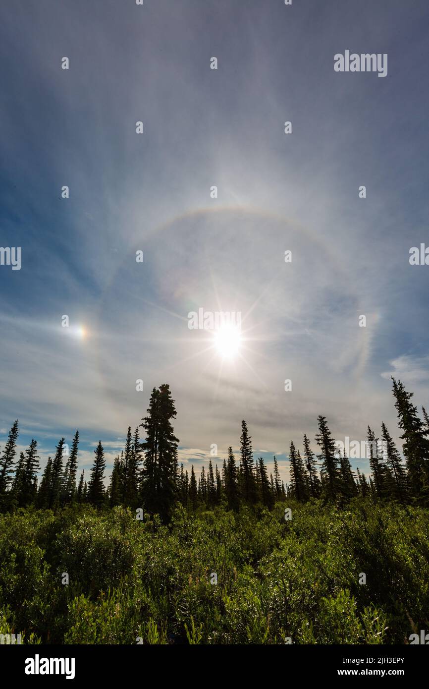 Summer sun dog (parhelion) in the sky, near Deline, Northwest ...