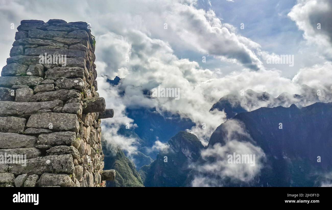 Stone Temple in Machu Piccu on foggy day early in the morning. High ...