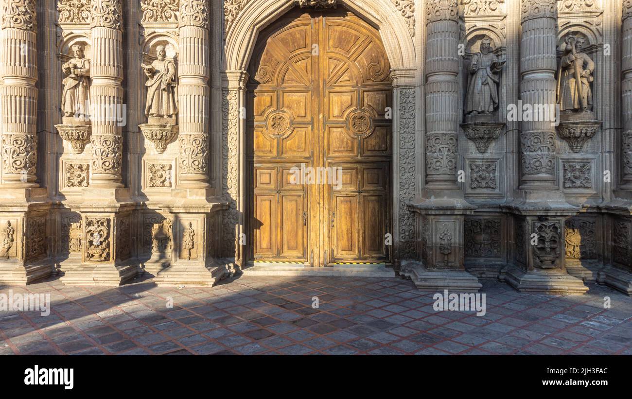 Front door at facade of catholic church Stock Photo - Alamy