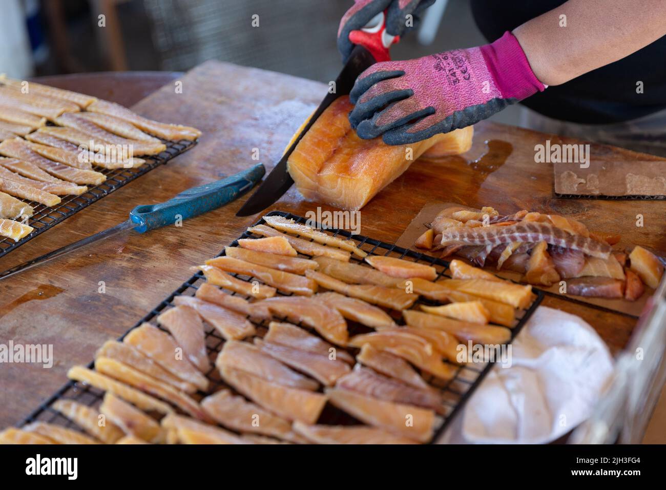 First nations woman fish hi-res stock photography and images - Alamy