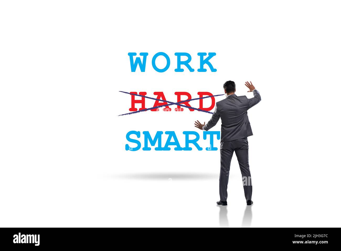 Businessman in the working smart not hard concept Stock Photo - Alamy
