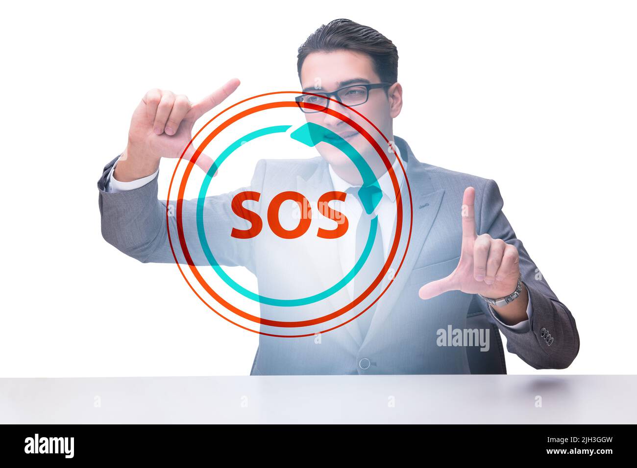 Businessman pressing SOS button in the case of danger Stock Photo - Alamy