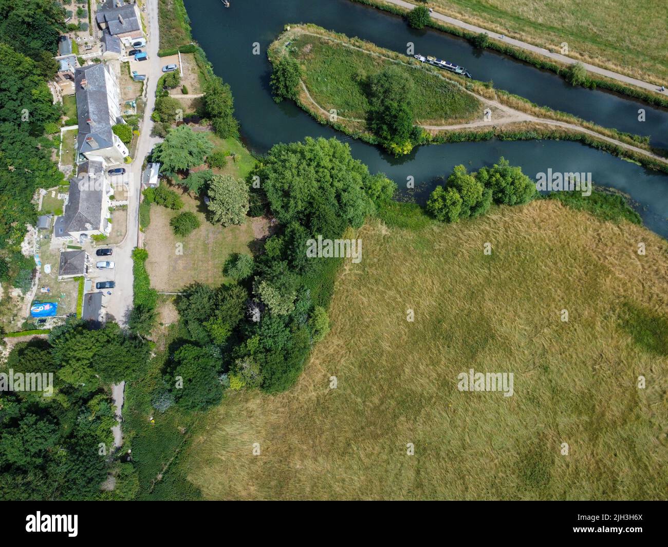 Aerial down shot of river junction and beautiful houses in Hertford UK ...