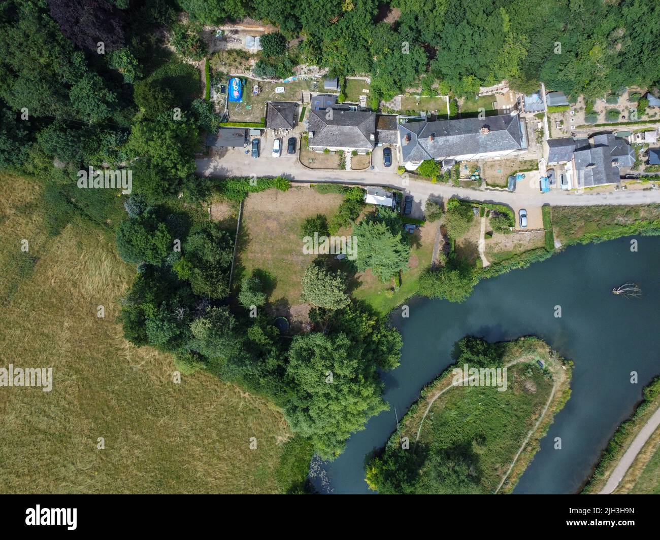 Aerial down shot of river junction and beautiful houses in Hertford ...