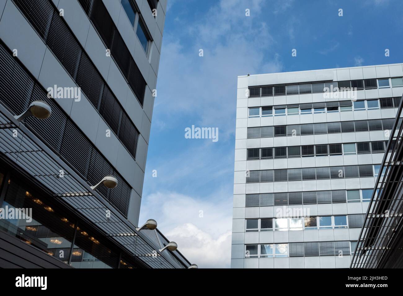 Outdoor sunny exterior view between building with mixture rectangular ...