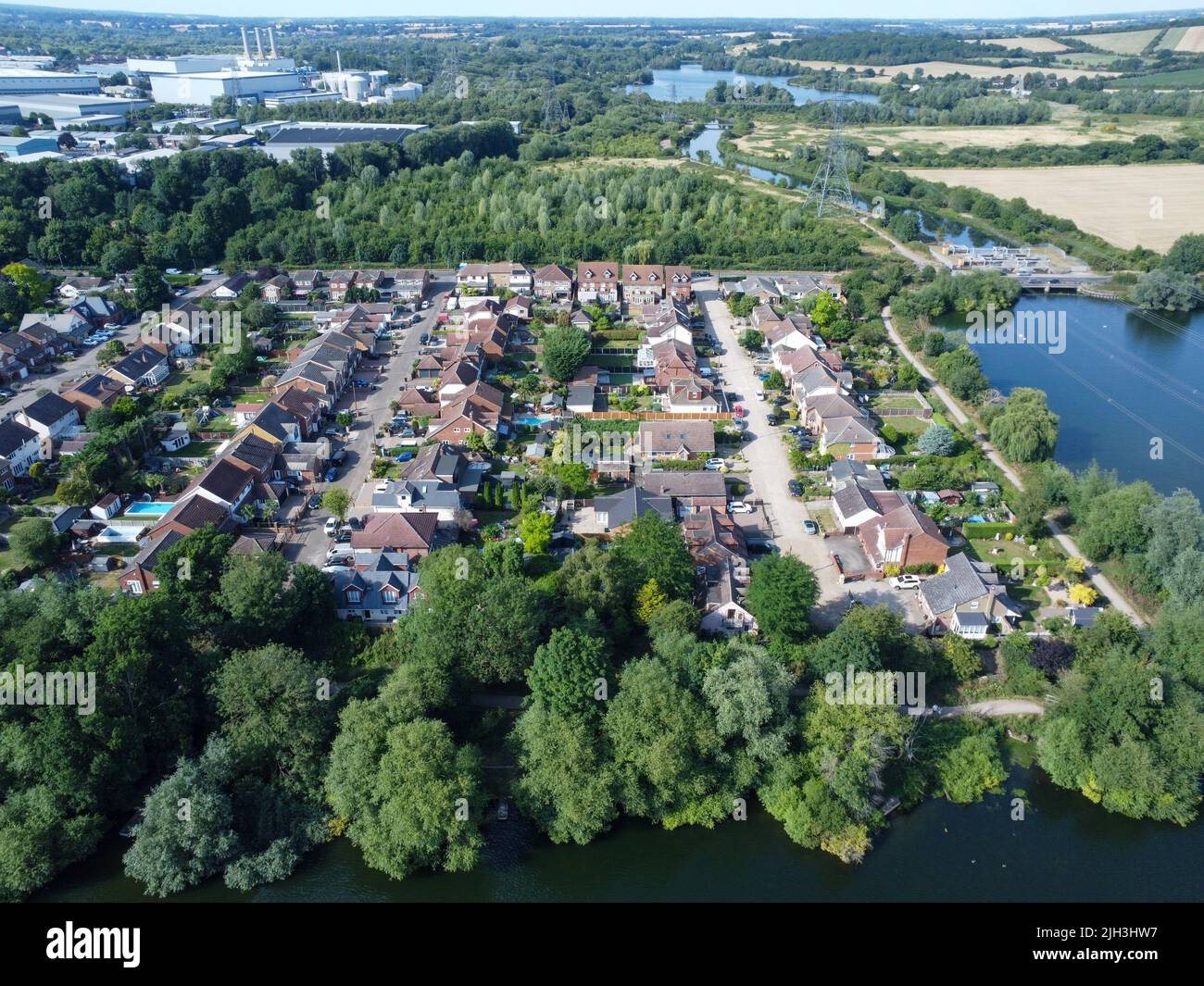 Aerial view of riverside housing estate Stock Photo - Alamy