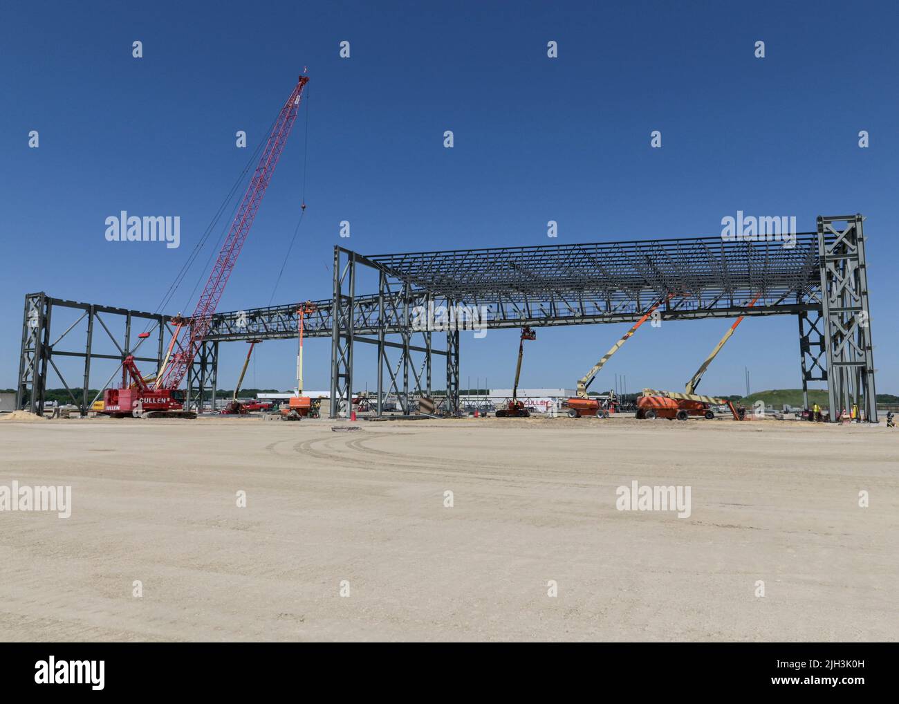 Contractors work on building a structure that will become the new 115th ...