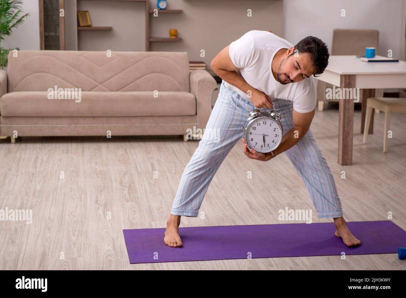 Man starting doing morning exercises hi-res stock photography and ...