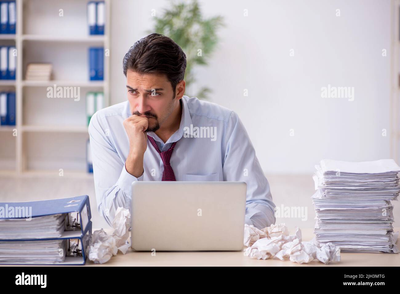 Young businessman employee in rejected ideas concept Stock Photo - Alamy