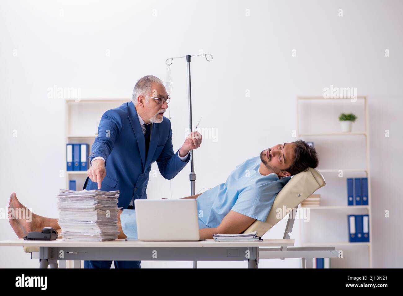 Passing out papers hi-res stock photography and images - Alamy