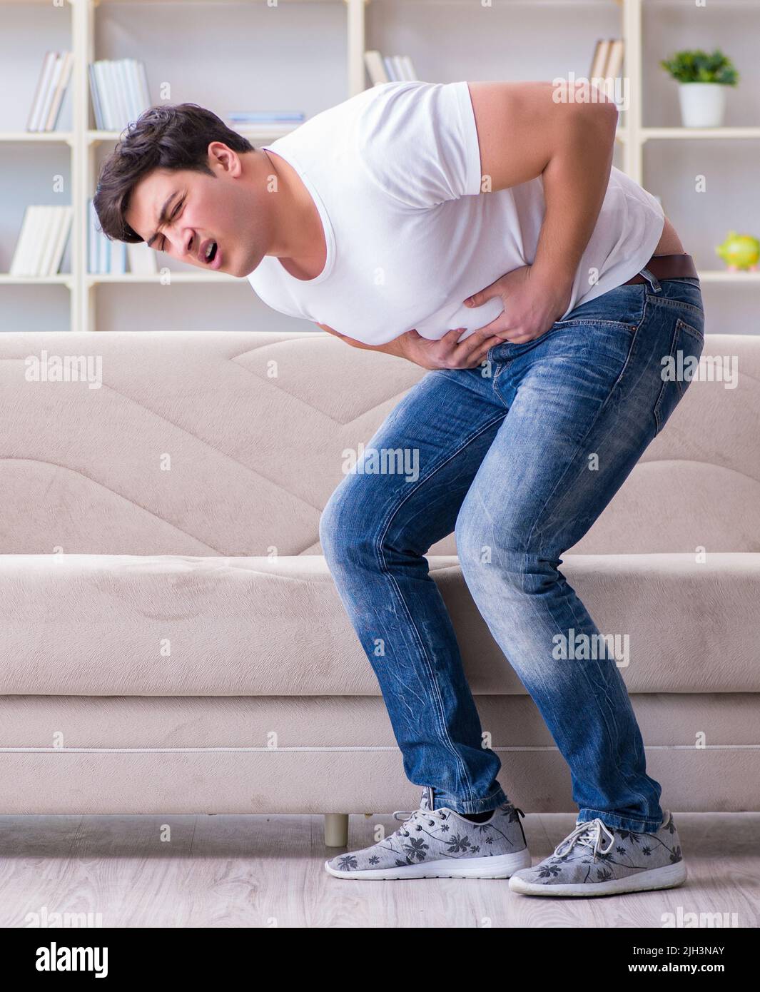 The man suffering from sick stomach and vomiting Stock Photo - Alamy