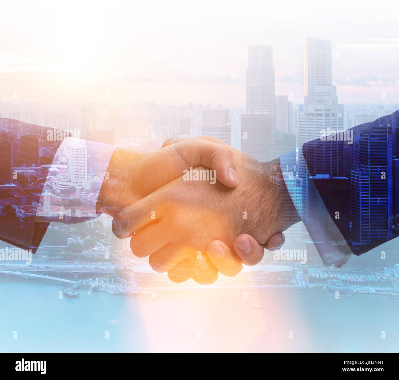 The concept of cooperation with handshake Stock Photo - Alamy