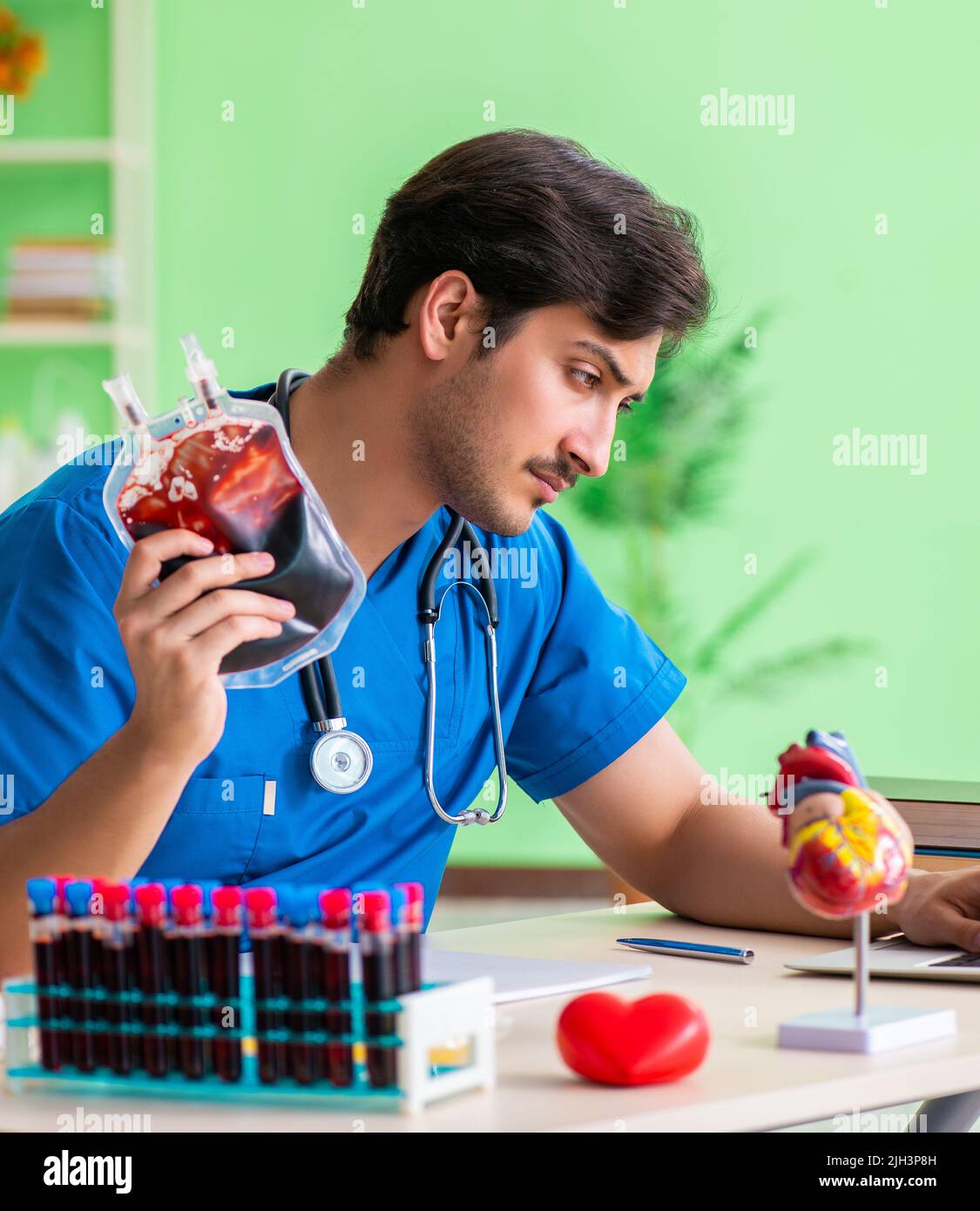 The doctor doing blood analysis in the lab Stock Photo - Alamy