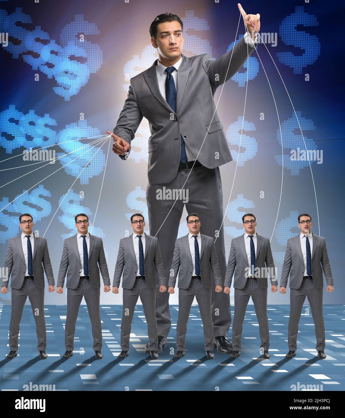 Boss employee manipulating his staff in business concept Stock Photo ...
